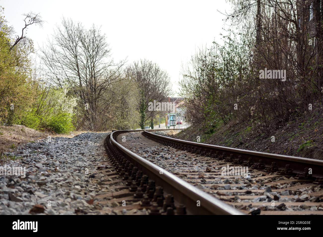 a section of railway with two tracks running through a scenic area ...