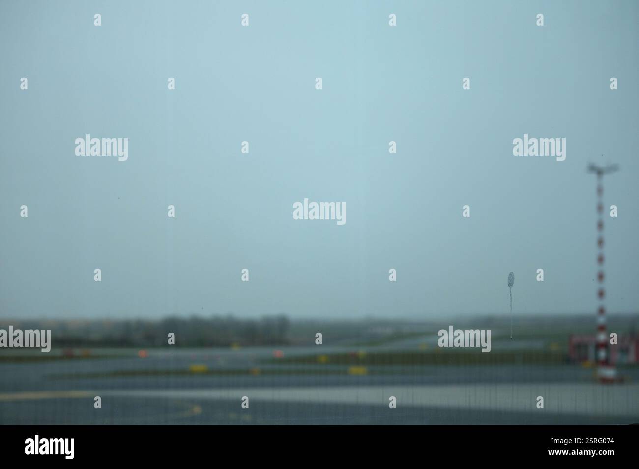 an airport runway covered in snow and fog Stock Photo - Alamy