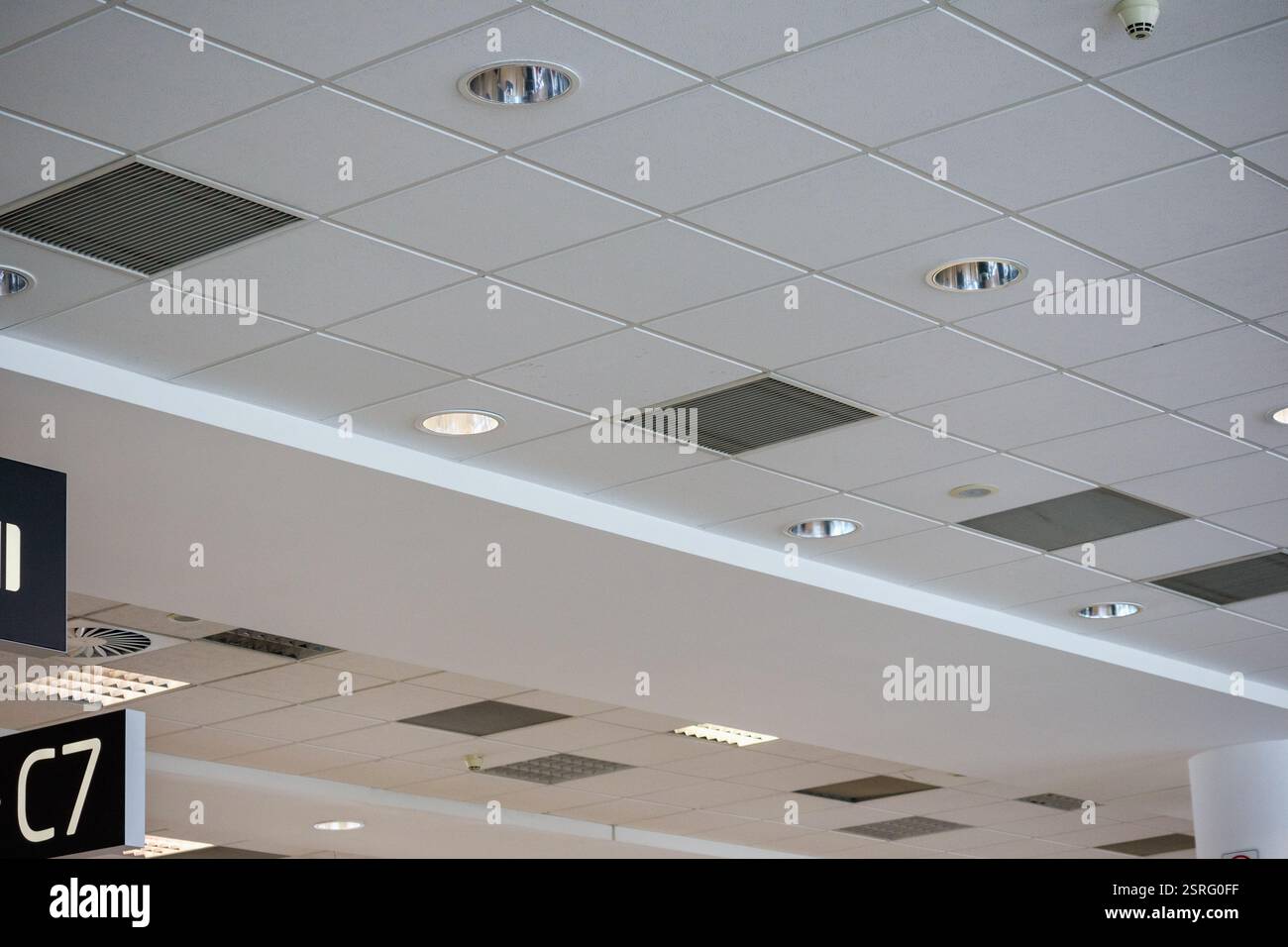 Ceiling with suspended ceiling panels and recessed lights Stock Photo ...