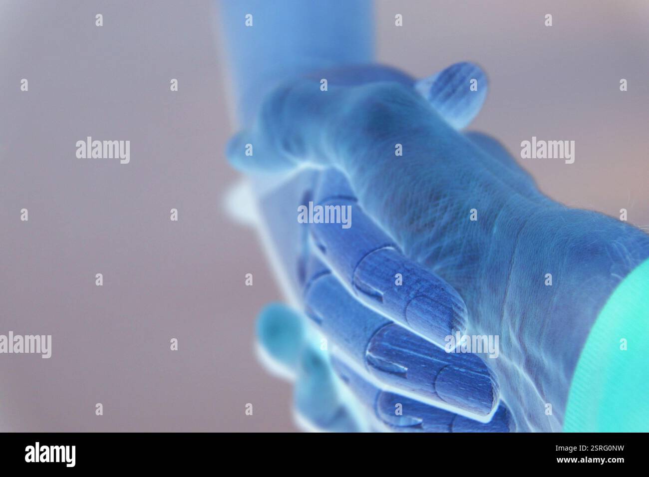 Robot and human handshake, joint efforts, collaboration Stock Photo - Alamy