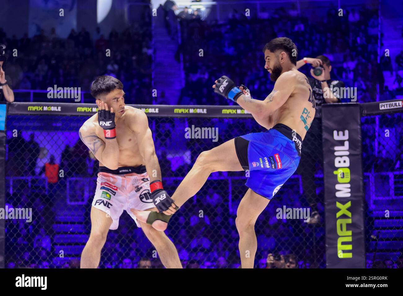 Luka Milidragovic (blue shorts) of Croatia fights against Luka Ceranja ...