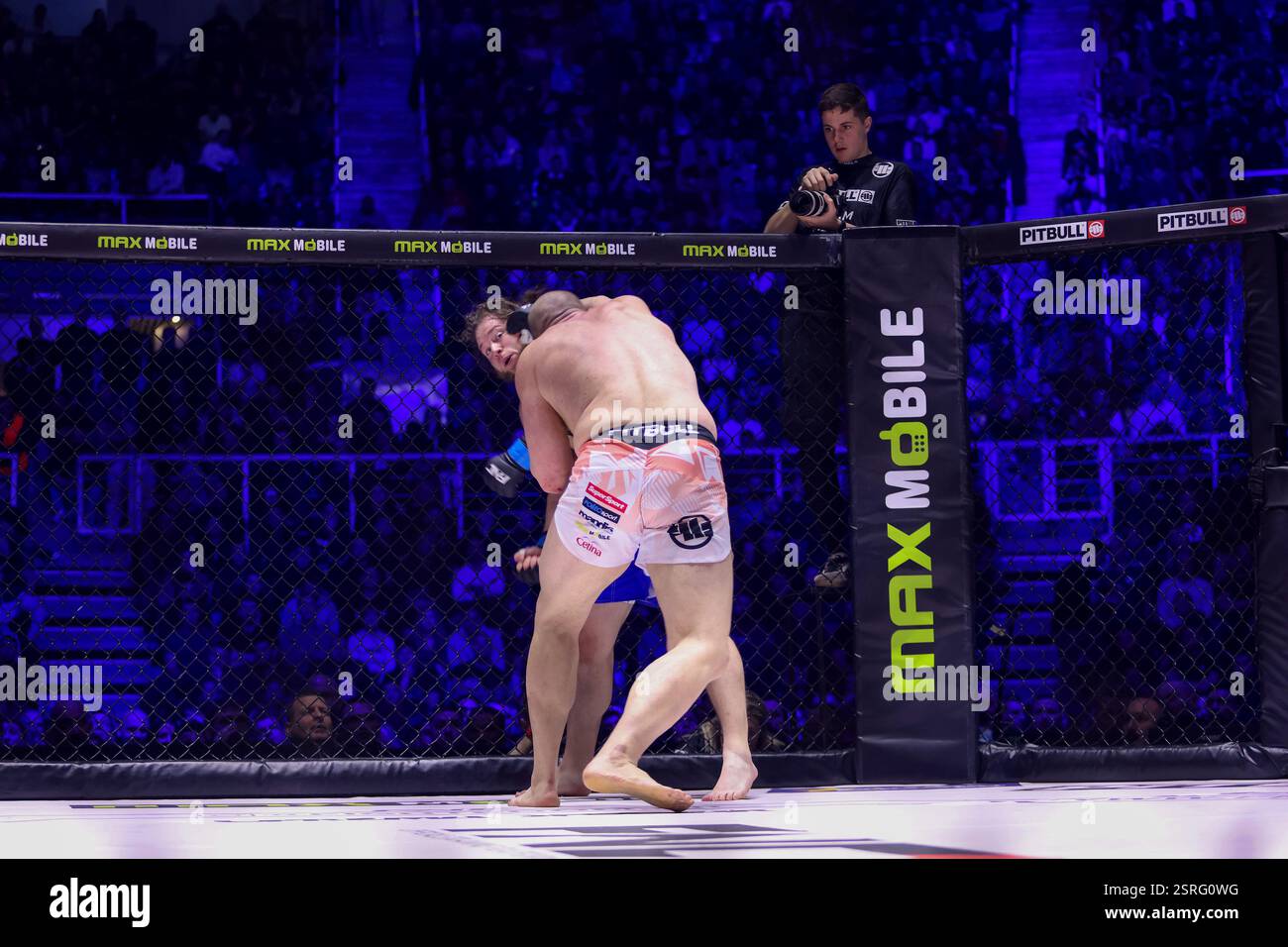 Jeremy Kimball (blue shorts) of United States fights against Benjamin ...