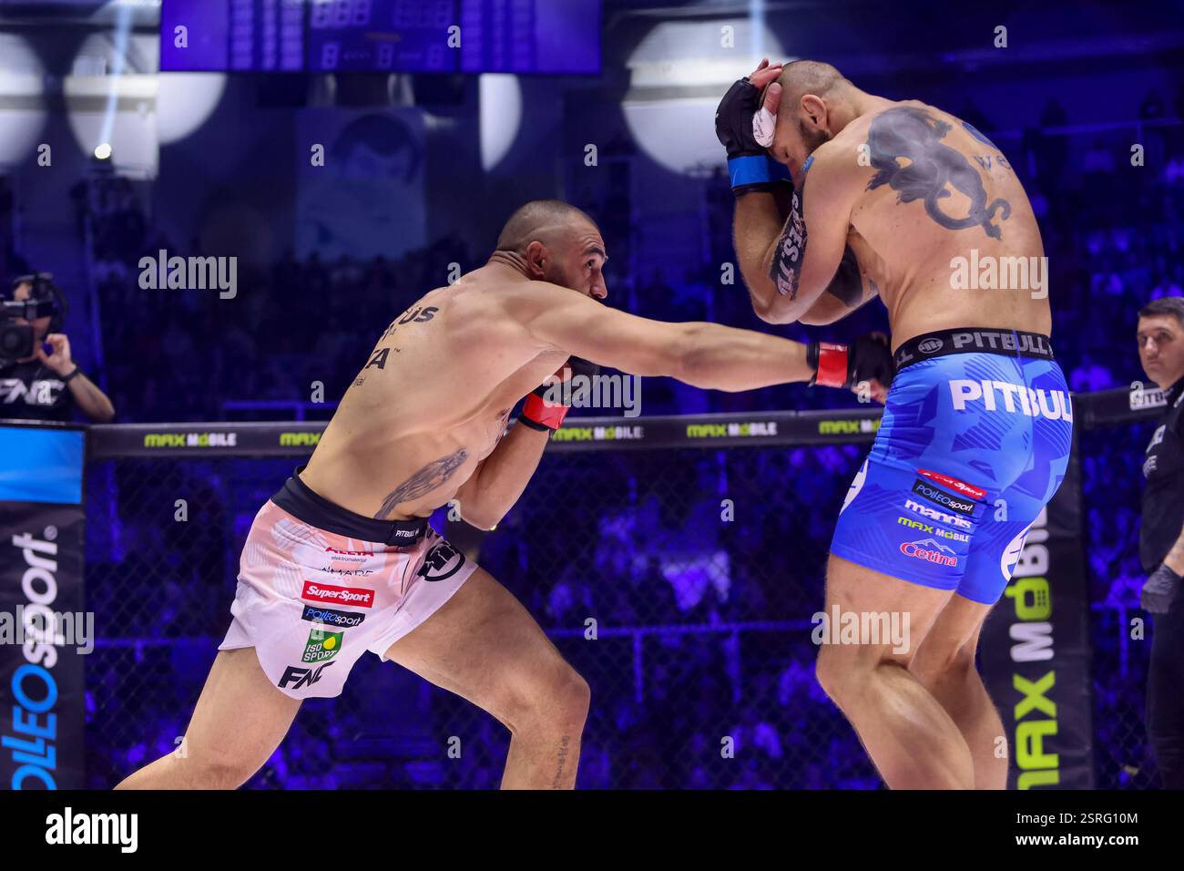Michal Andryszak (blue shorts) of Poland fights against Martin Batur ...