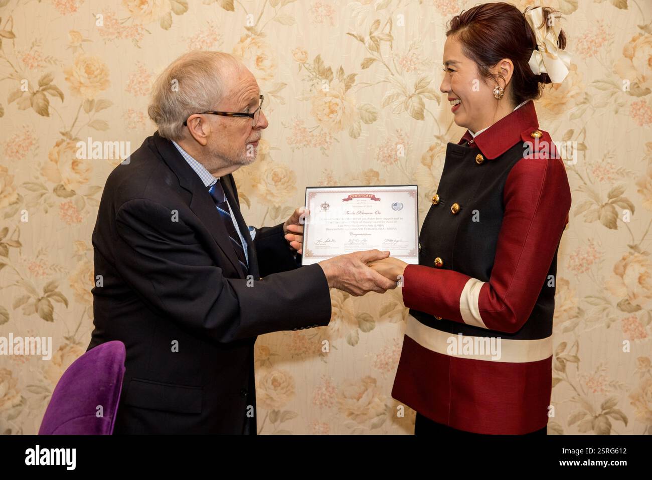 LABA co-chairman Harrison Engle is presenting Certificate of LABA Asian ...