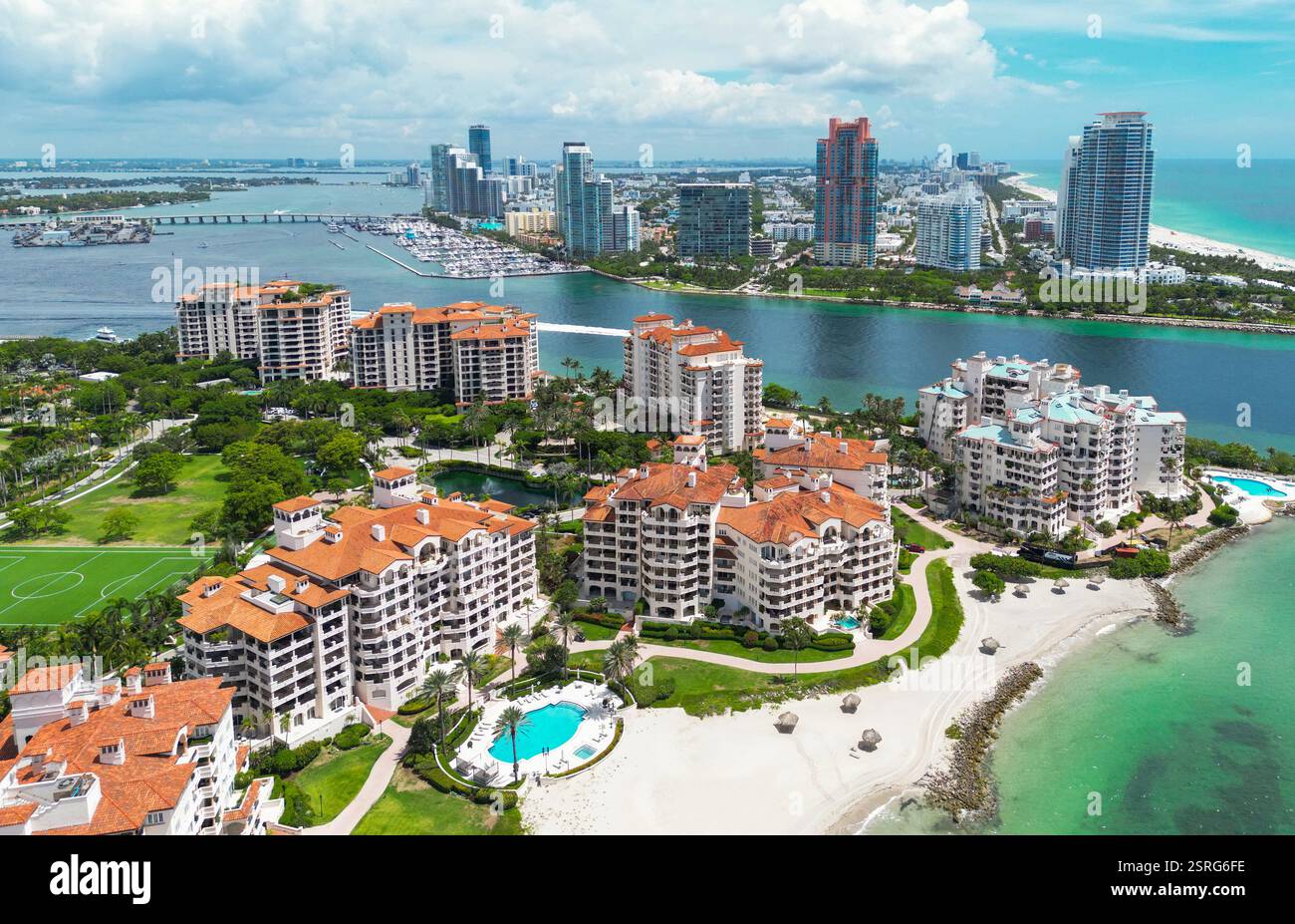 Miami cityscape with luxury skyscrapers and ocean. Panoramic drone view ...