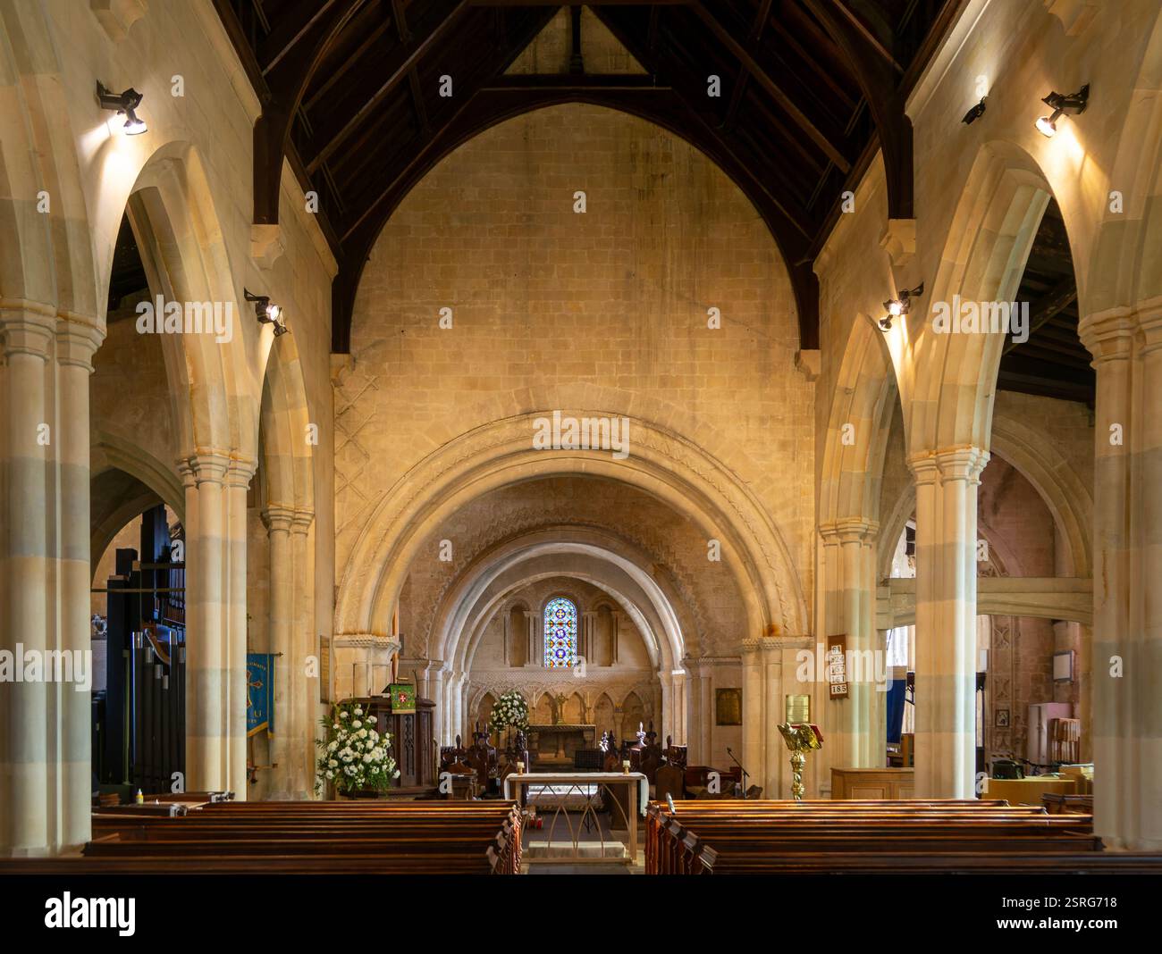 Norman chancel architecture inside church of Saint John the Baptist ...