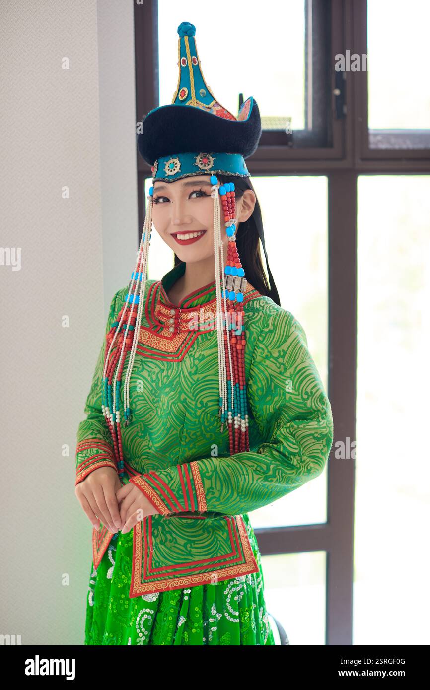 Mongolian girl wearing traditional costume of the Mongolian Stock Photo ...
