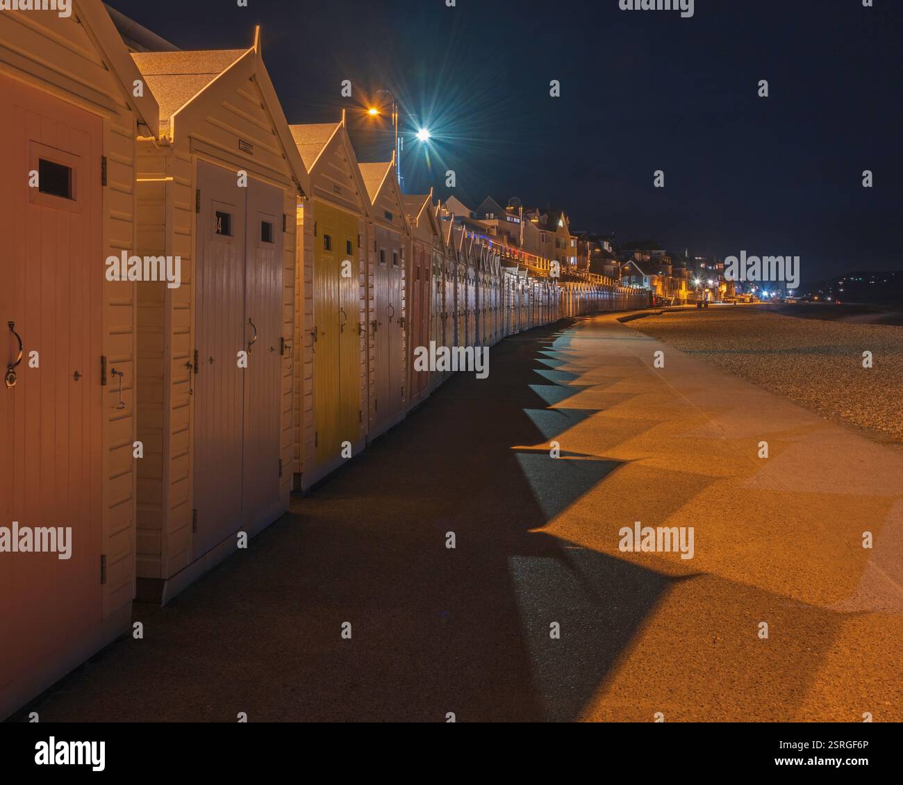 A nighttime view of the beach huts along Marine parade below Langmoor ...