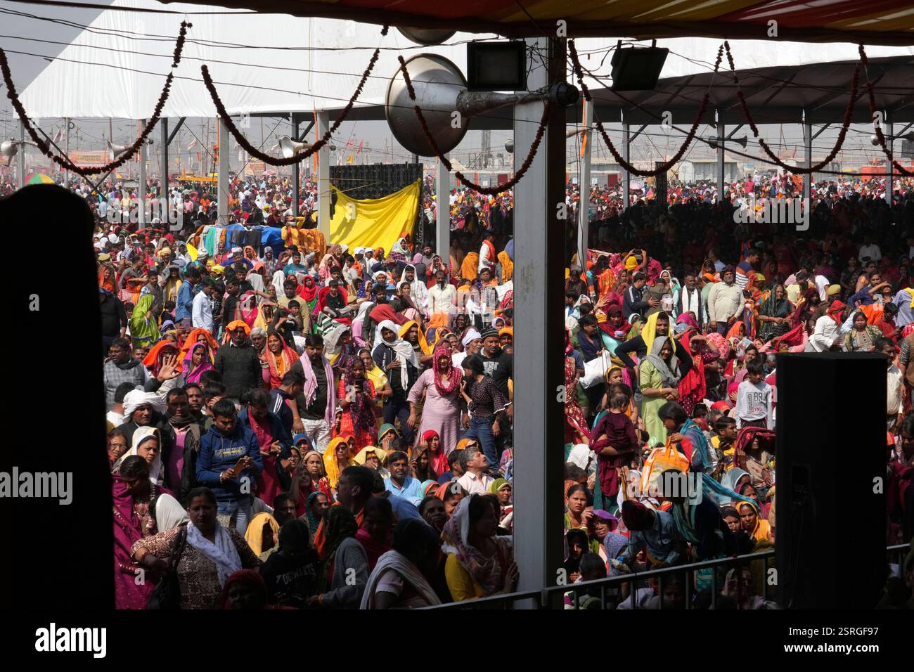 Hindu devotees listen to a religious leader Pandit Pradeep Mishra at ...