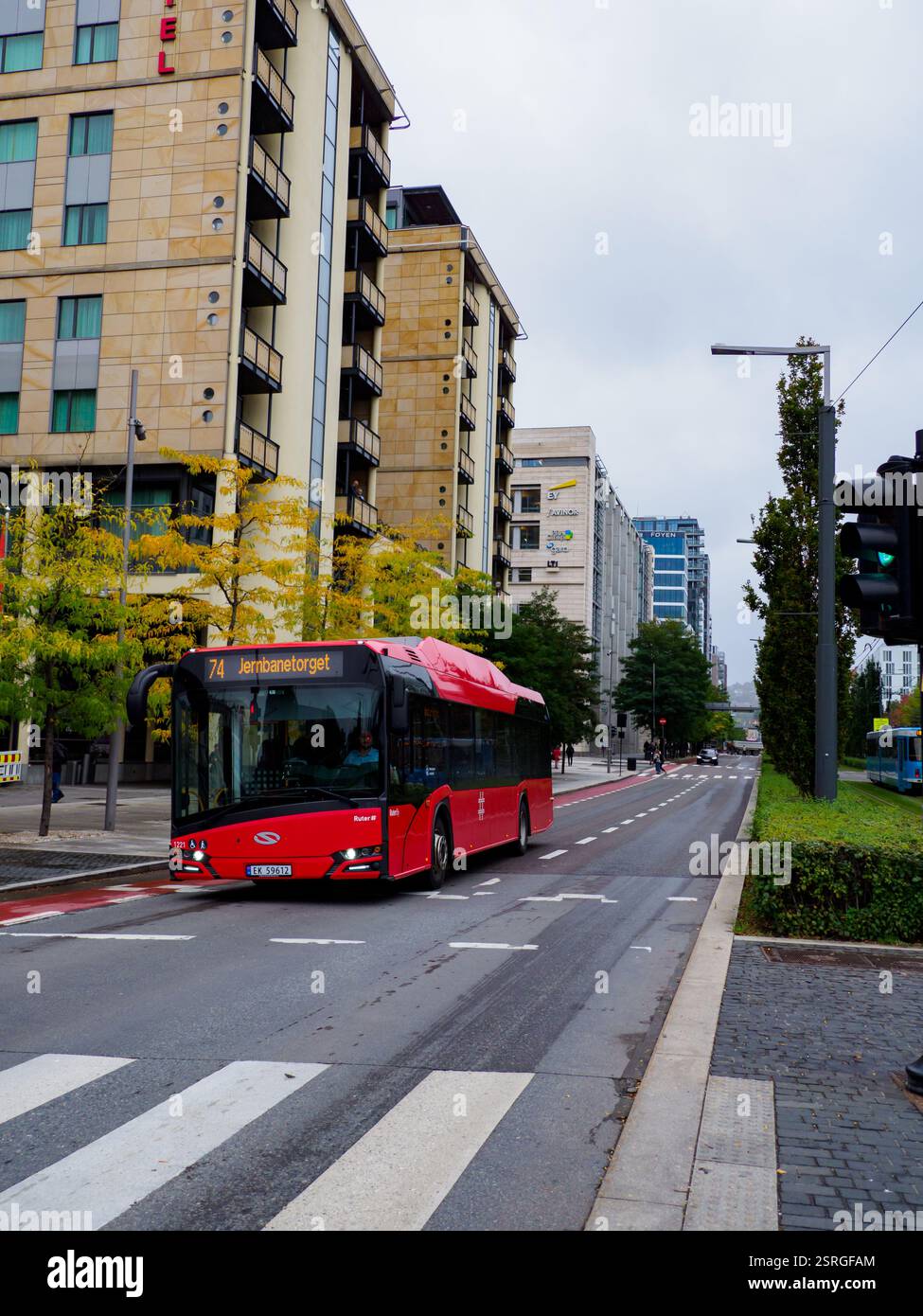 Oslo, Norway - Sep, 2022: Red bus on the Dronning Eufemias gate street ...