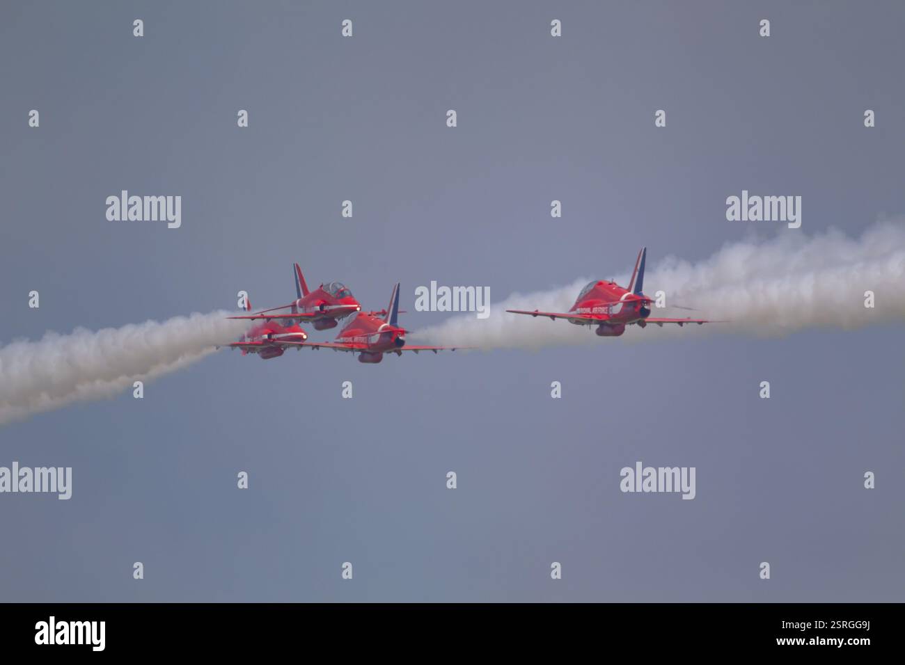 BAE Systems Hawk four aircraft of the RAF Royal air force Red Arrows display team flying ...
