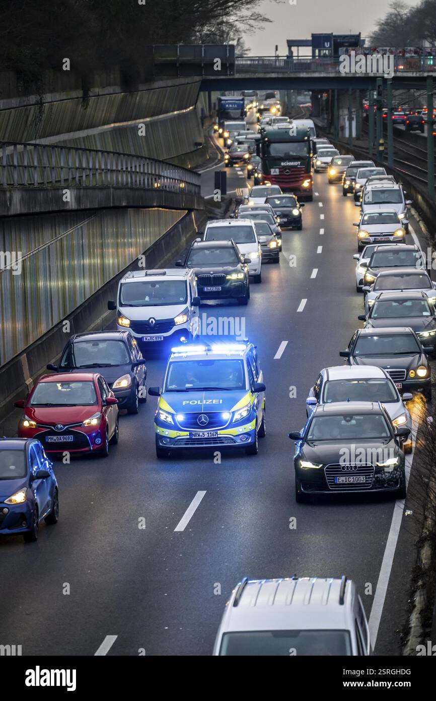 Traffic jam on the A40 motorway, emergency lane, vehicles on the left ...