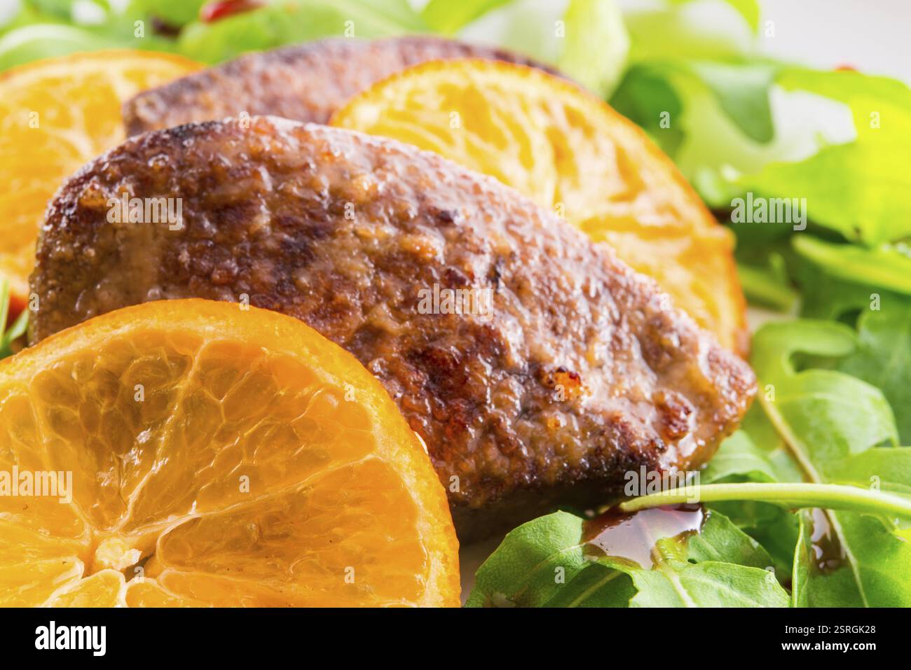 Liver with onion-orange sauce Stock Photo - Alamy
