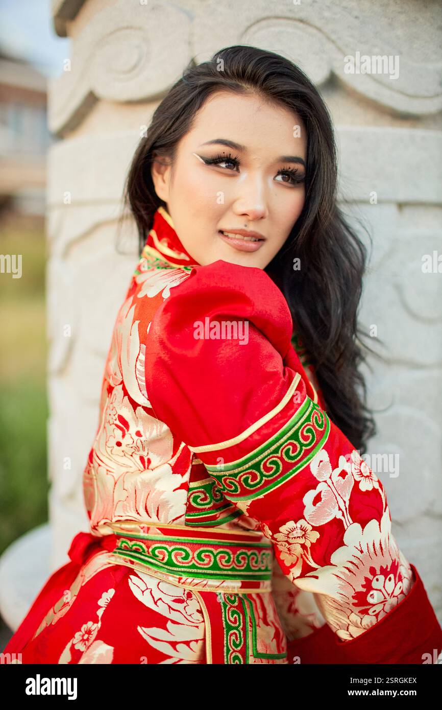 Mongolian girl wearing traditional costume of the Mongolian Ordos tribe Stock Photo - Alamy