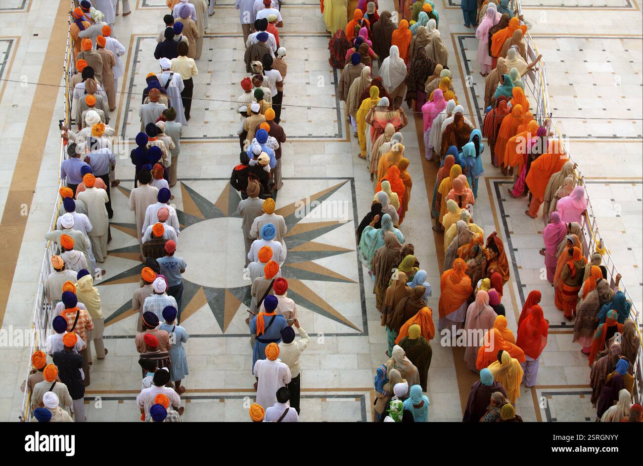 Sikh devotees in queues during celebration of consecration of perpetual ...