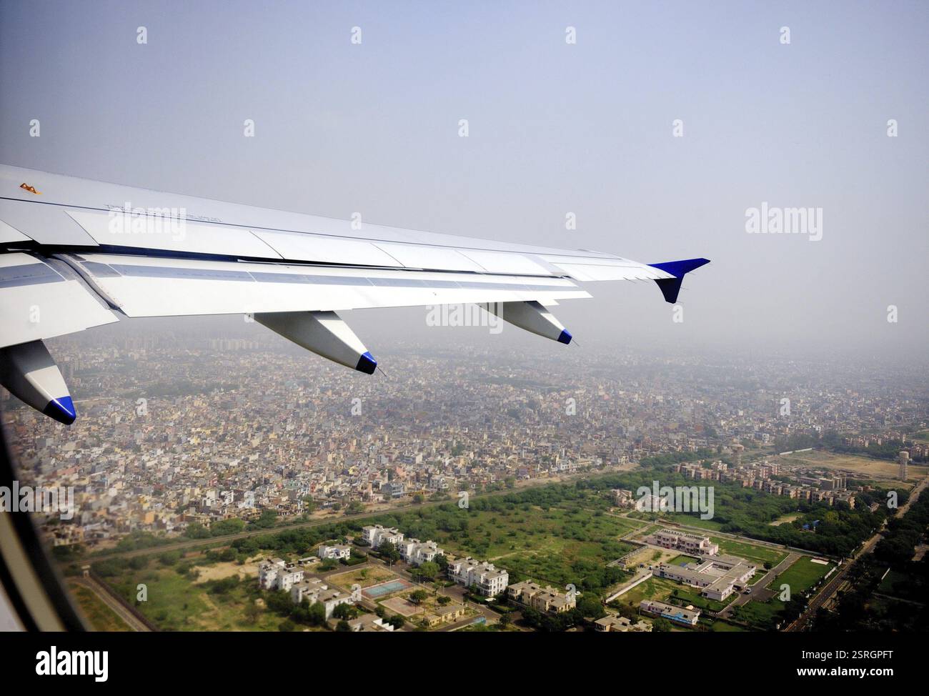 Aerial view of city and aircraft wing, Delhi, India, Asia Stock Photo ...