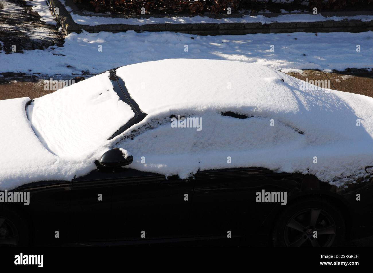 Copenhagen/ DenmarK/16 FEBRUARY 2025/ Cars window sheild coverred with ...