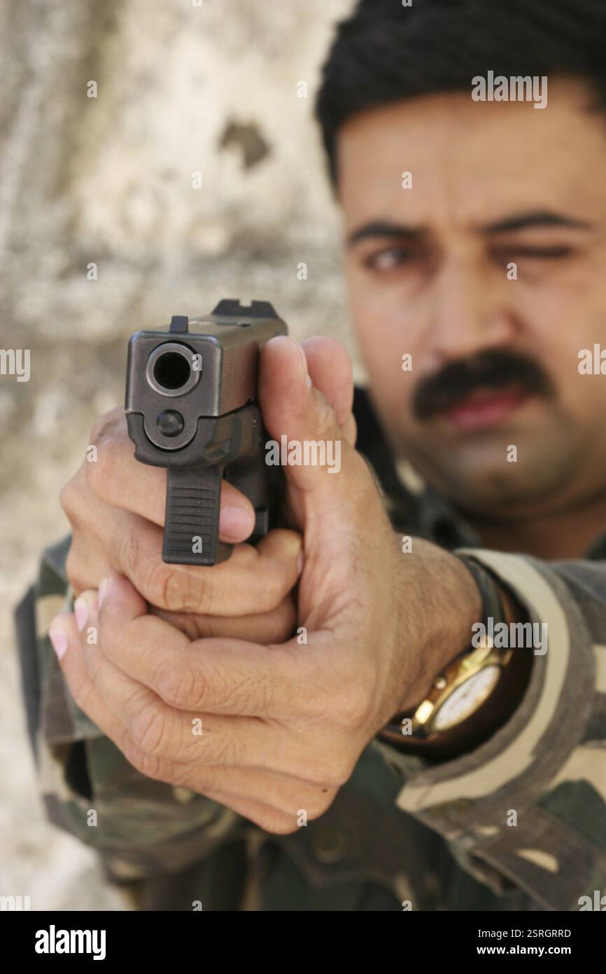 Black Cat commando with a revolver, Glock, India MR#725 Stock Photo - Alamy