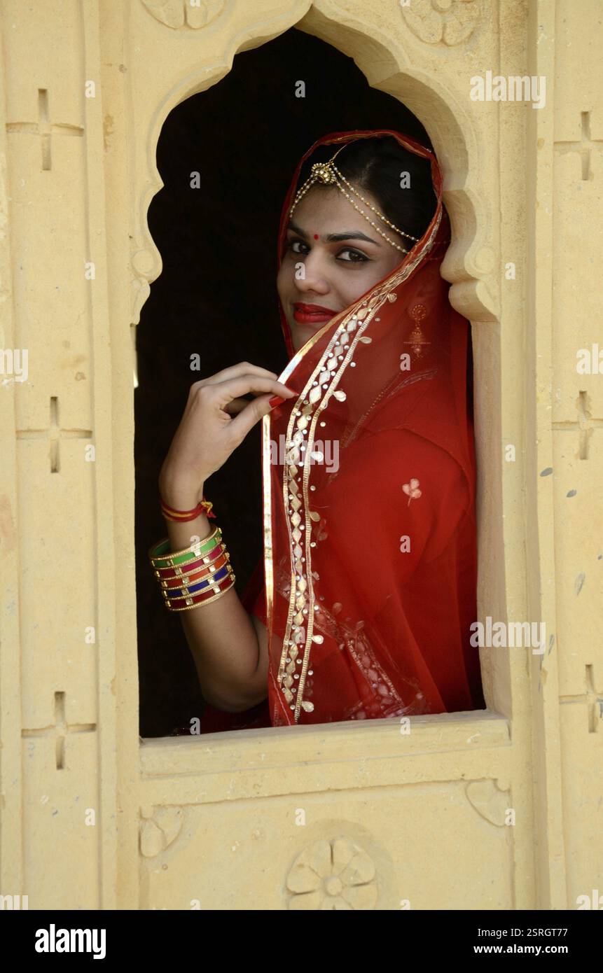 Woman in ghunghat window, Kuldhara, Jaisalmer, Rajasthan, India, Asia ...