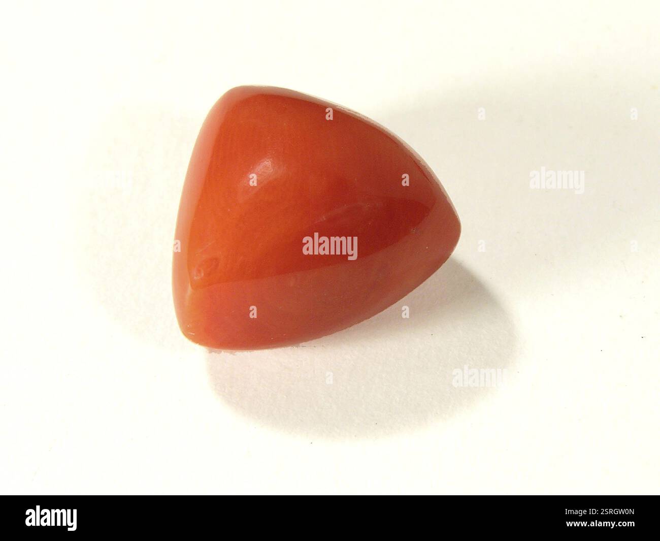 One triangle shape of coral munga gems according to astrology ...