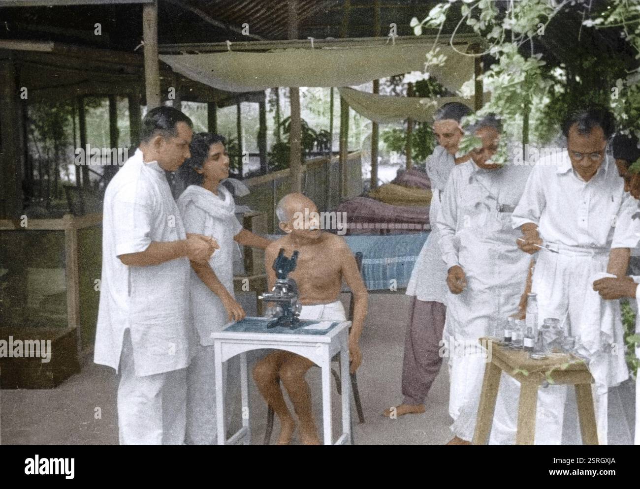 Dr Gajjar showing Mahatma Gandhi hookworm ova under microscope, Mumbai ...