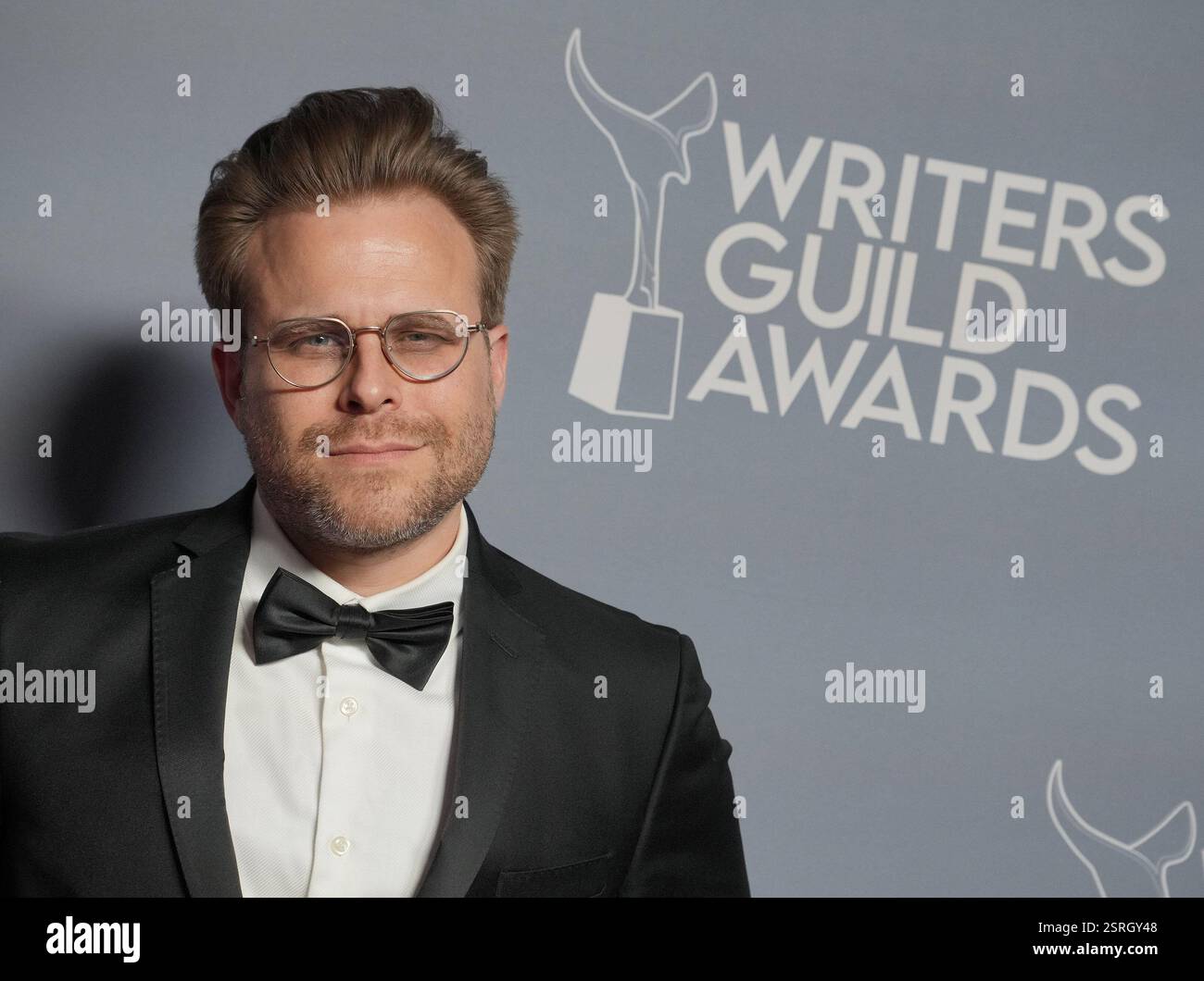 Adam Conover arrives at the 2025 Writers Guild Awards held at the ...