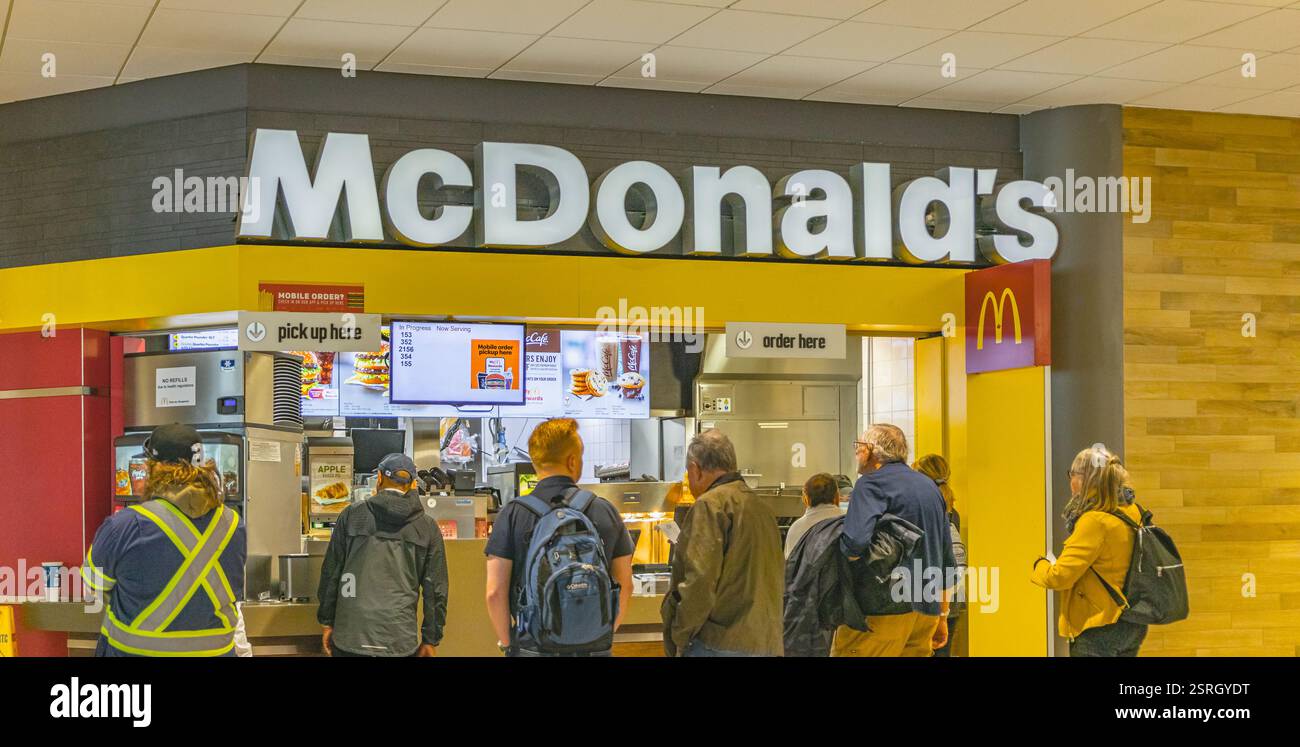 People buying McDonald fast food outside a restaurant building, in ...