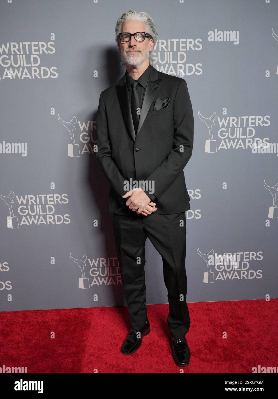 Mark Monroe arrives at the 2025 Writers Guild Awards held at the Beverly Hilton in Beverly Hills ...