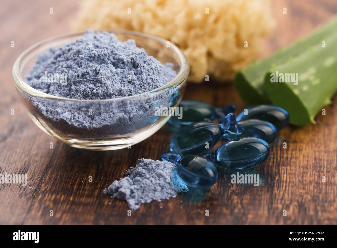 Blue clay mask with serum capsules Stock Photo - Alamy