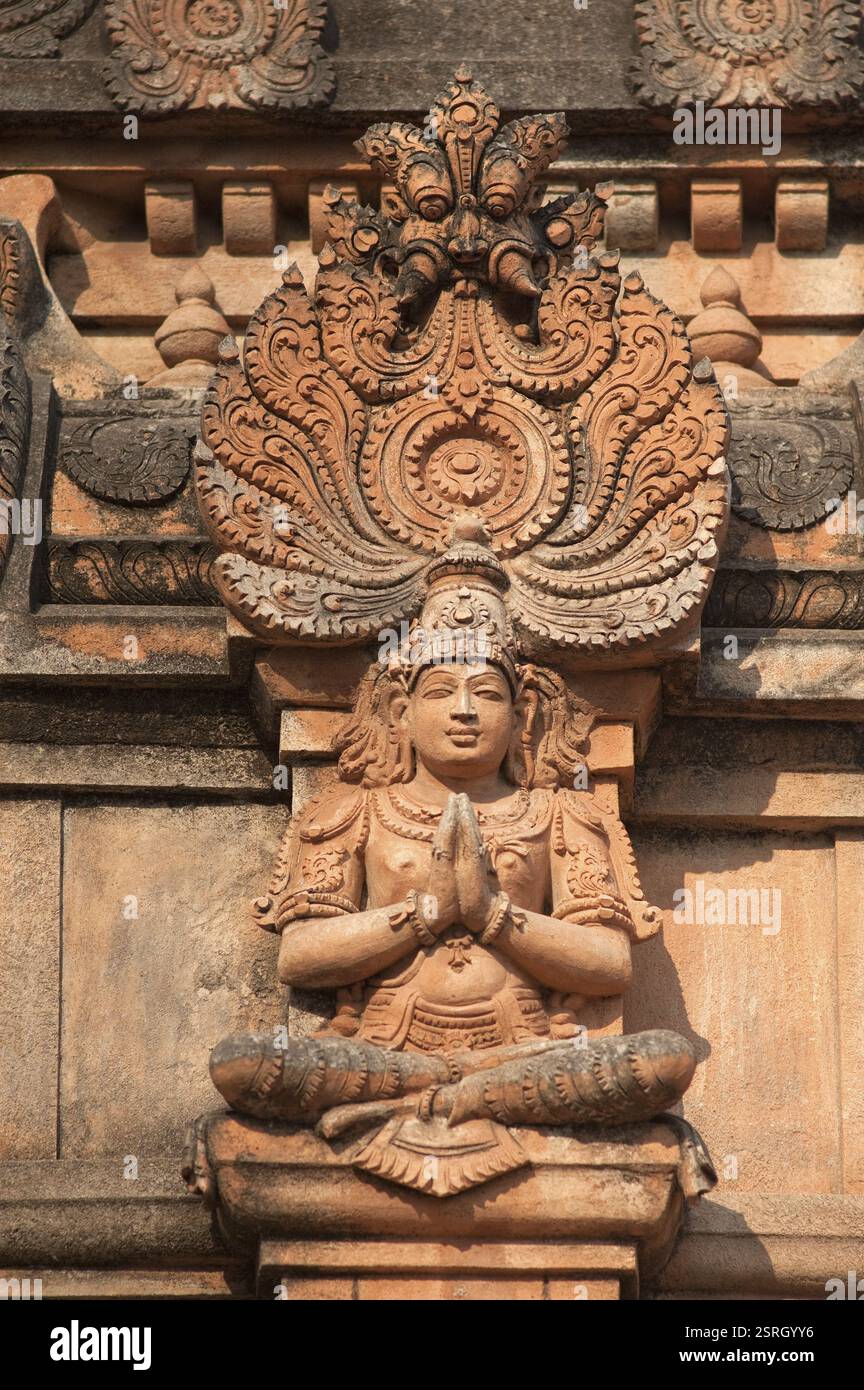 Sculpture of god and goddesses on the peak of krishna temple, Hampi ...