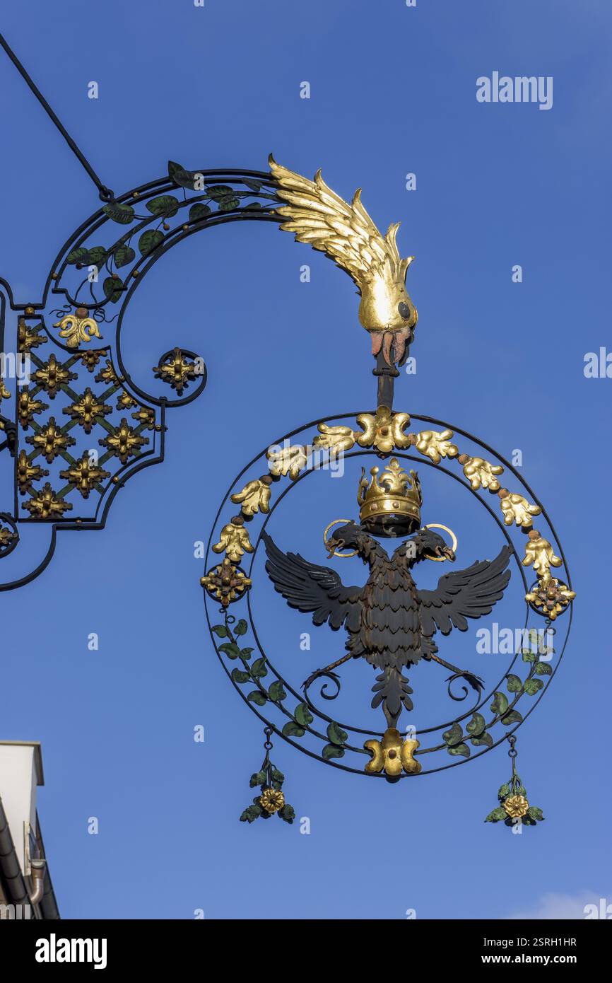 Guild sign (nose sign) with black double-headed eagle, in the old town ...