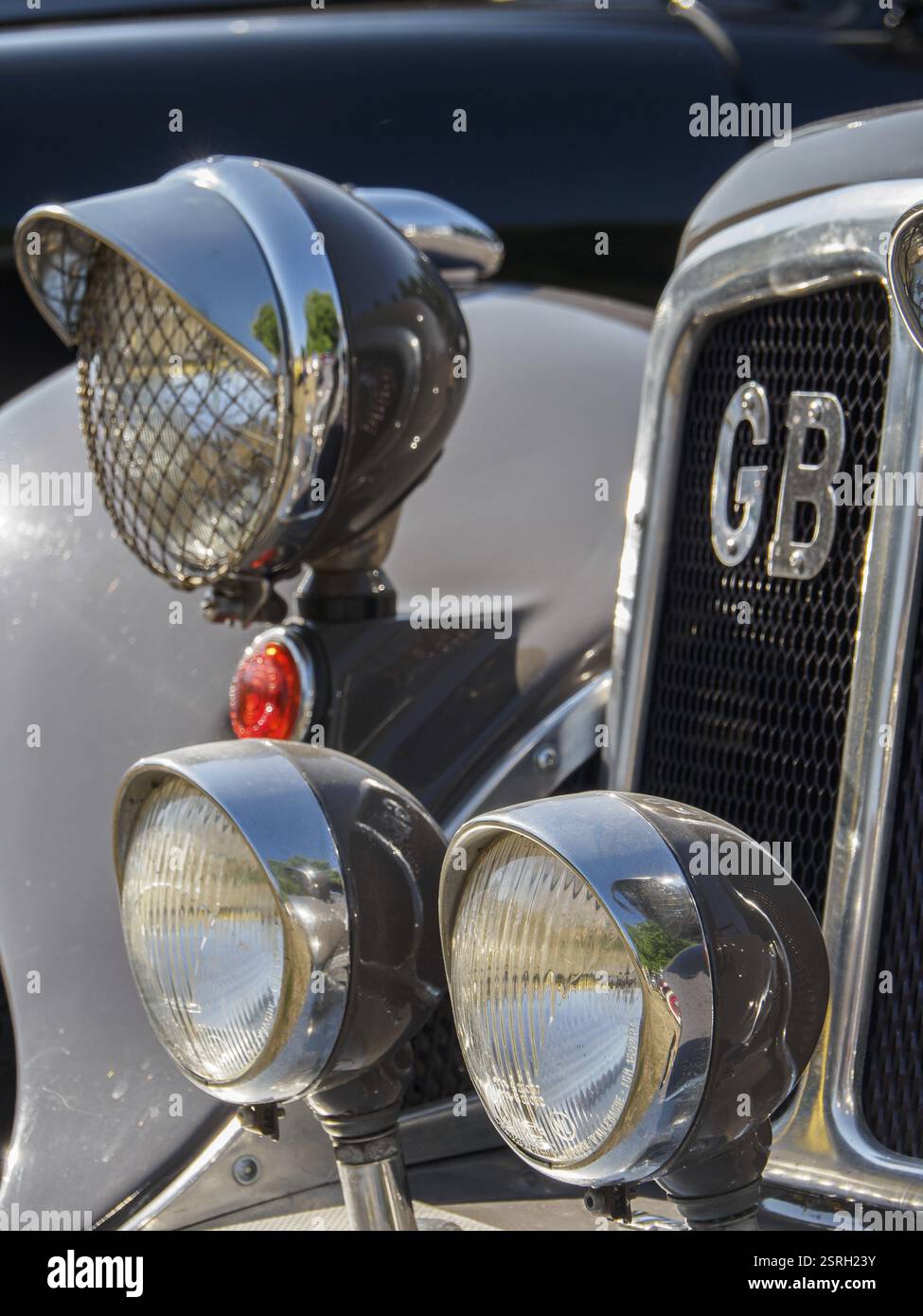 Shiny grey front of classic cars with stylish chrome headlights ...