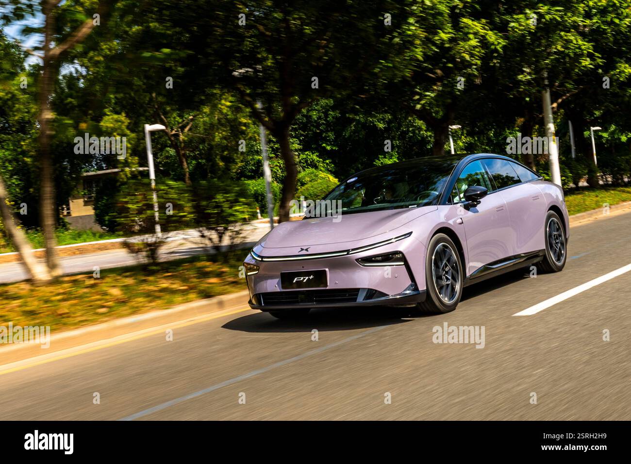 An XPeng P7+ Ultra Long Range Max version being driven on a test drive ...