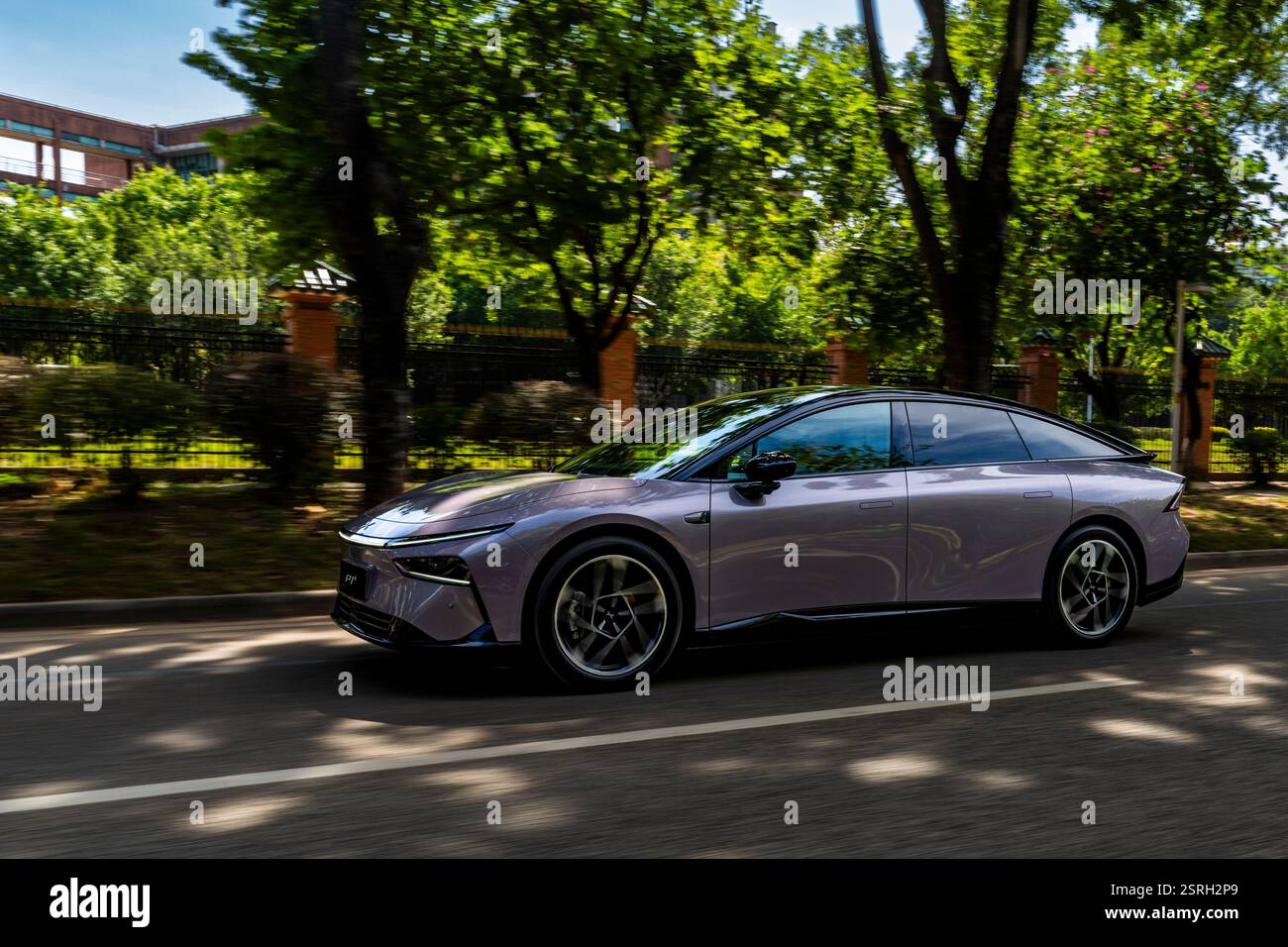 An XPeng P7+ Ultra Long Range Max version being driven on a test drive ...