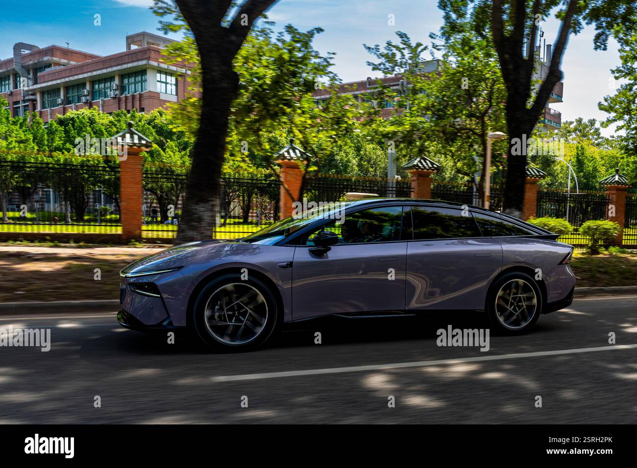 An XPeng P7+ Ultra Long Range Max version being driven on a test drive ...
