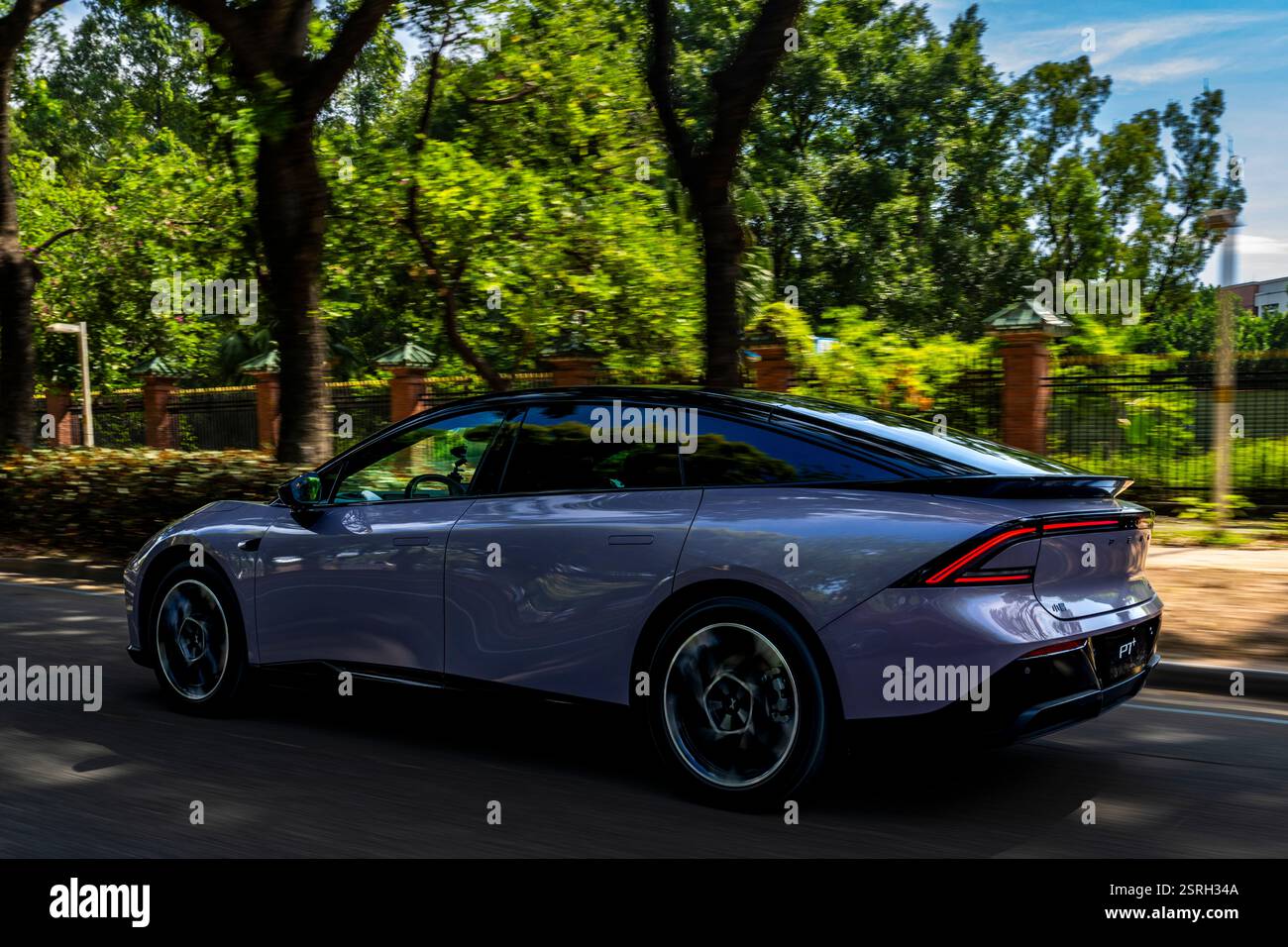 An XPeng P7+ Ultra Long Range Max version being driven on a test drive ...