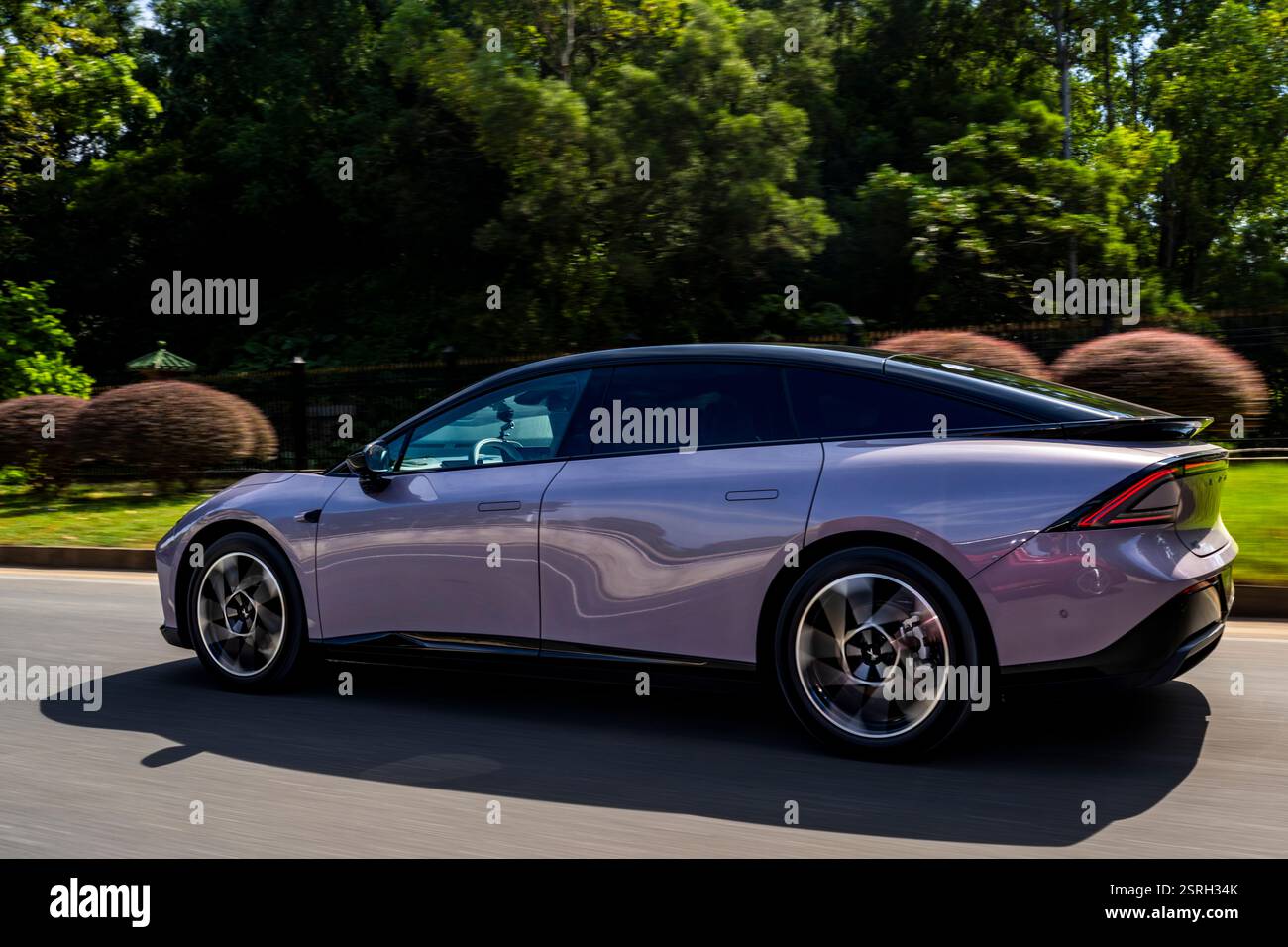 An XPeng P7+ Ultra Long Range Max version being driven on a test drive ...