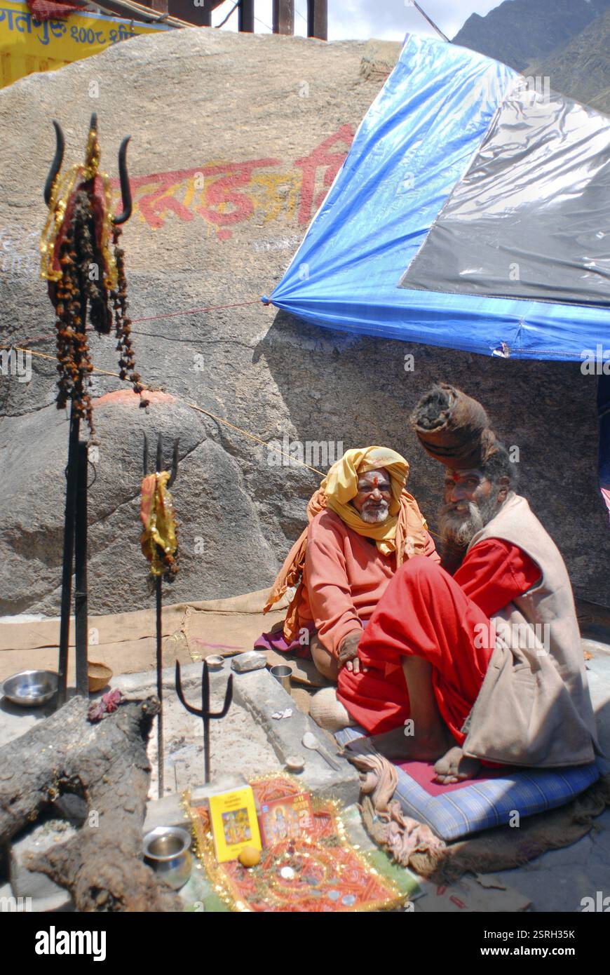 Sadhu sitting with trishul at Badrinath, Uttaranchal Uttarakhand, India ...