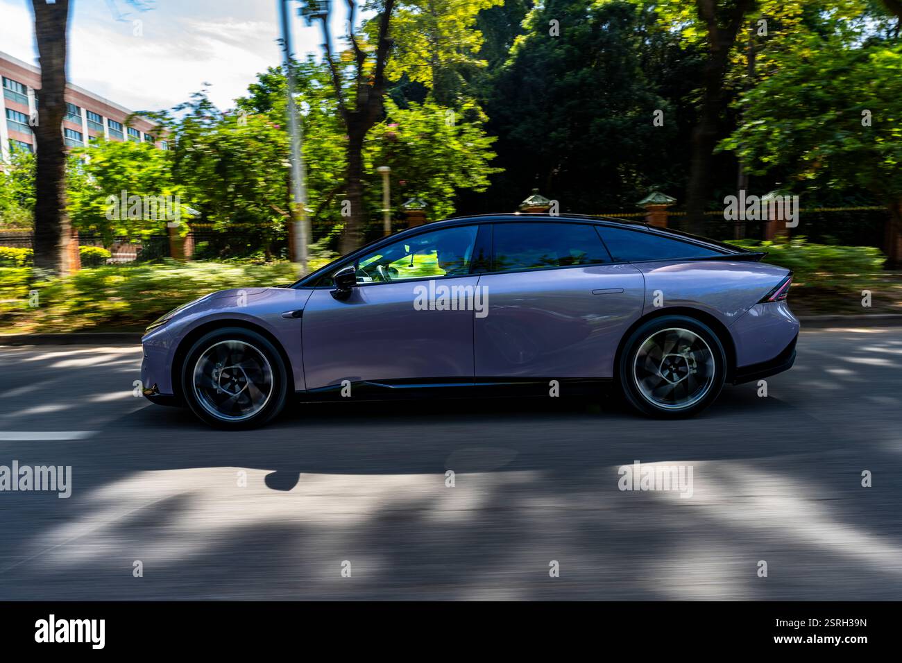 An XPeng P7+ Ultra Long Range Max version being driven on a test drive ...