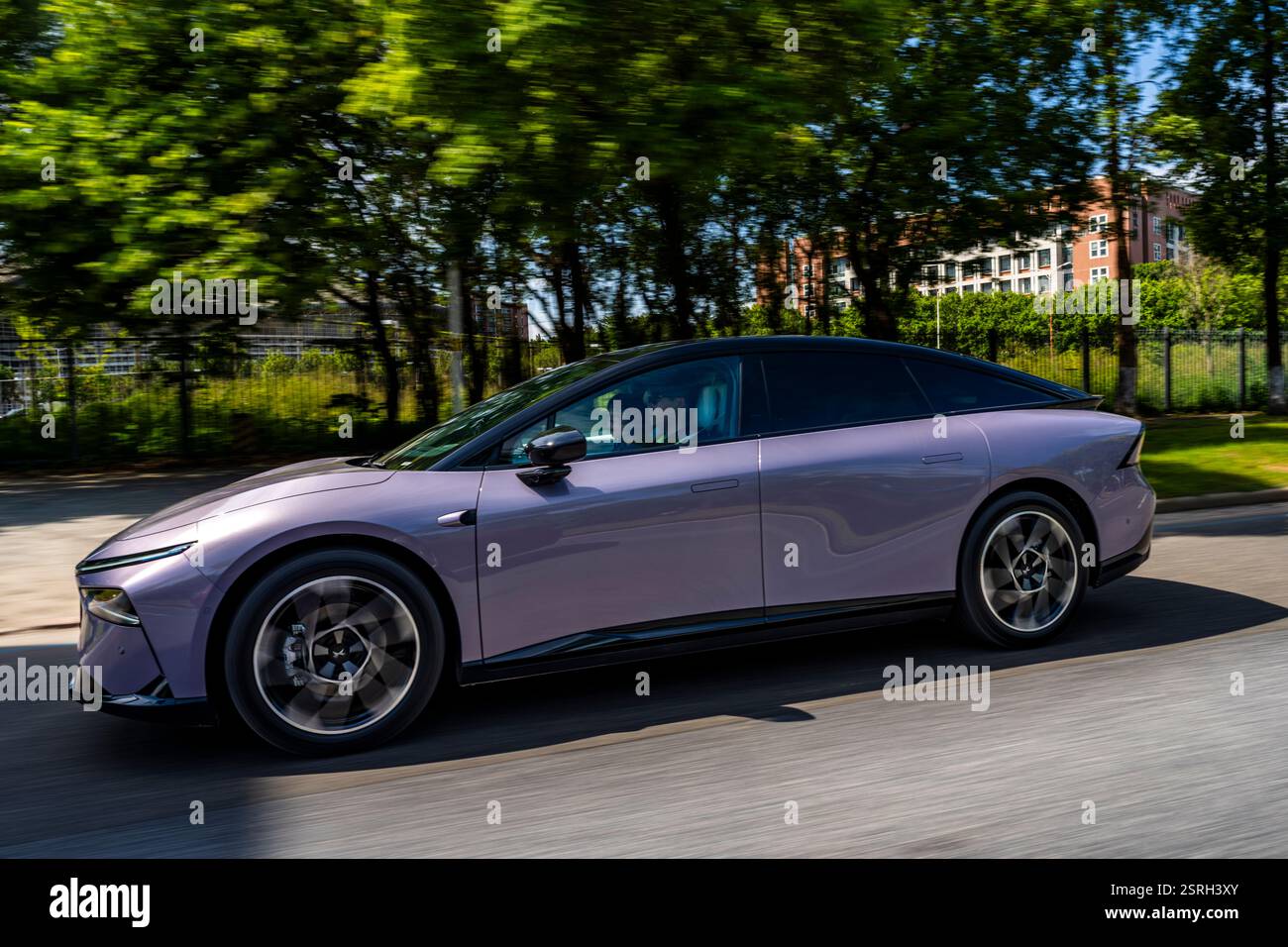 An XPeng P7+ Ultra Long Range Max version being driven on a test drive ...