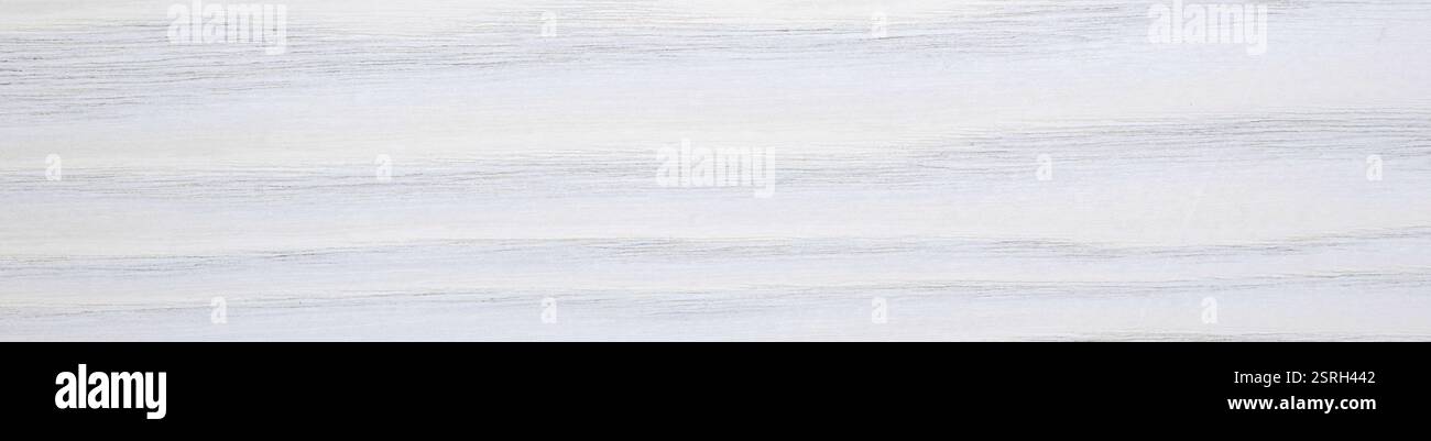 A pristine white ash veneer surface, where the faint wood grain ...