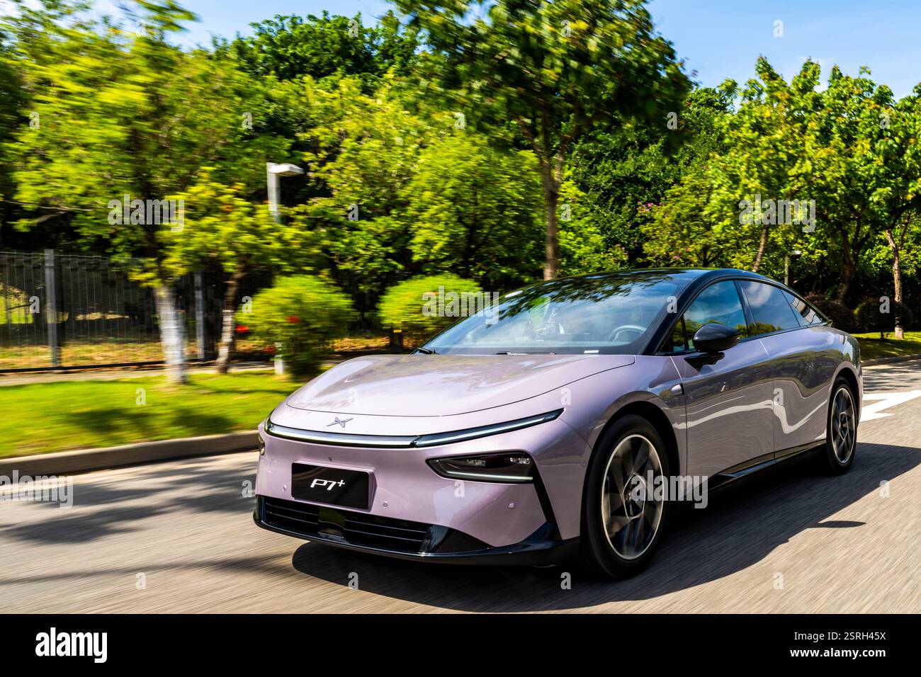 An XPeng P7+ Ultra Long Range Max version being driven on a test drive ...