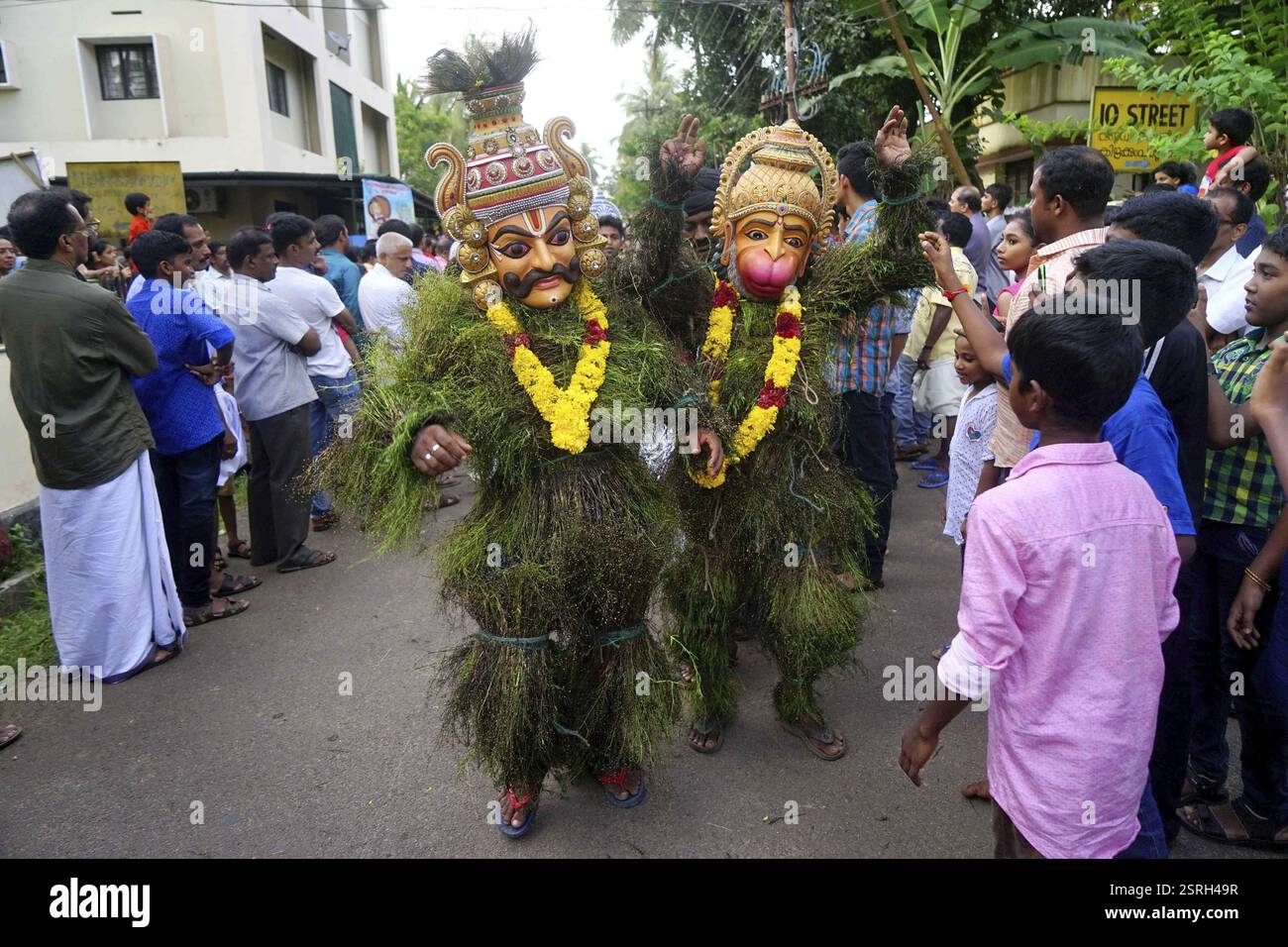 Traditional Kummatti dancers wear colourful wooden masks god Kummatti ...
