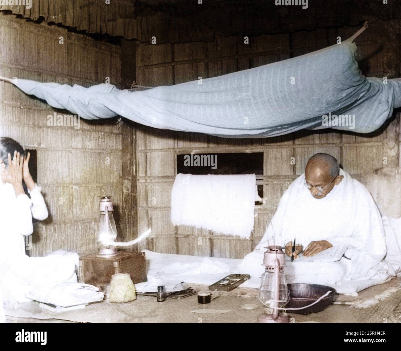 Mahatma Gandhi sitting writing in his hut, Assam, India, Asia, December ...