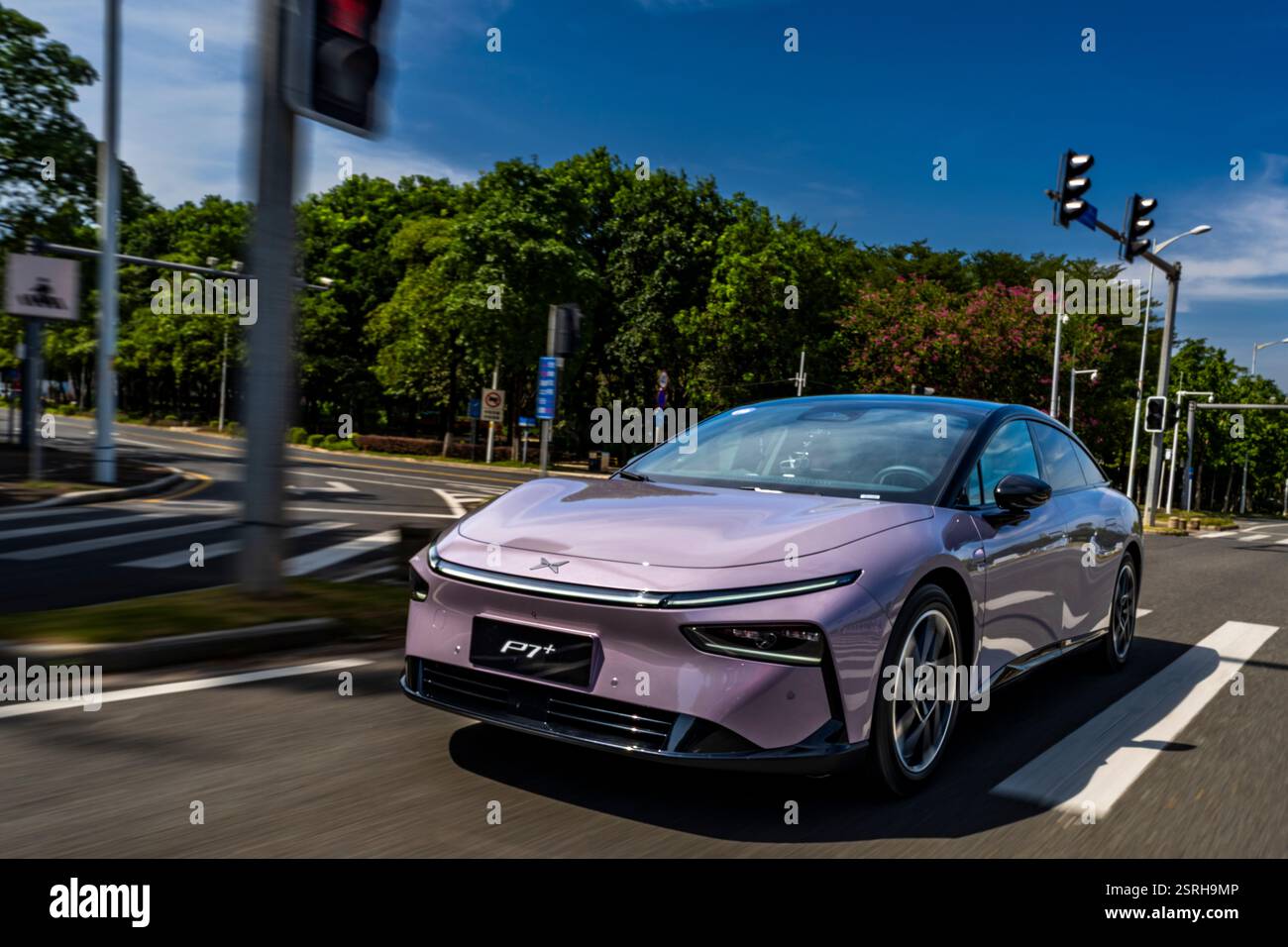 An XPeng P7+ Ultra Long Range Max version being driven on a test drive ...