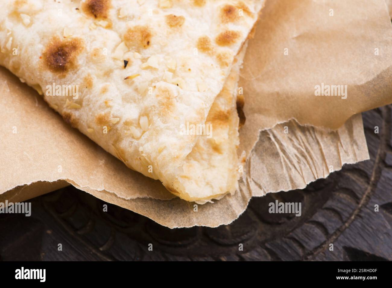 Garlic Naan, Indian flat bread Stock Photo - Alamy
