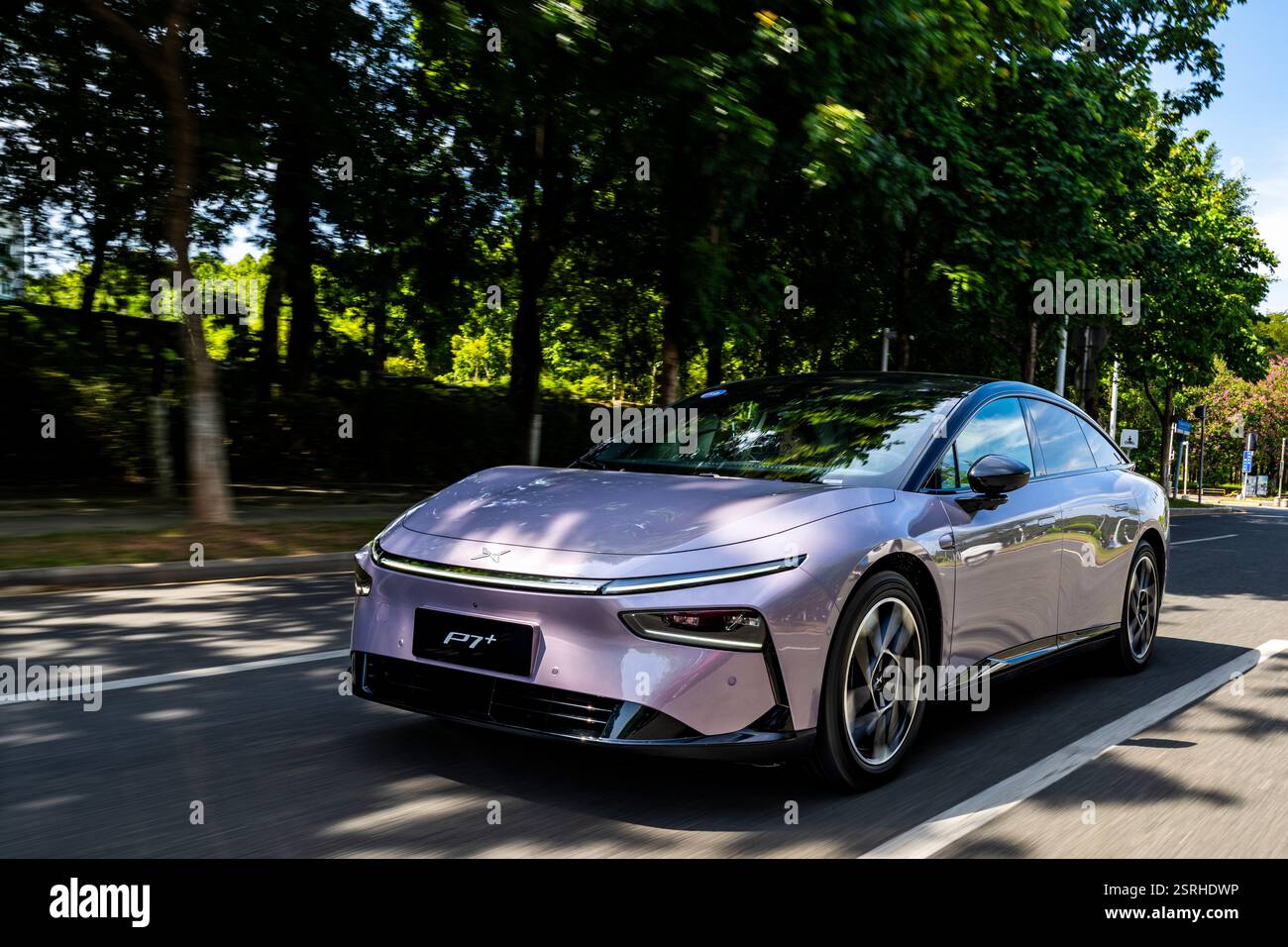 An XPeng P7+ Ultra Long Range Max version being driven on a test drive ...