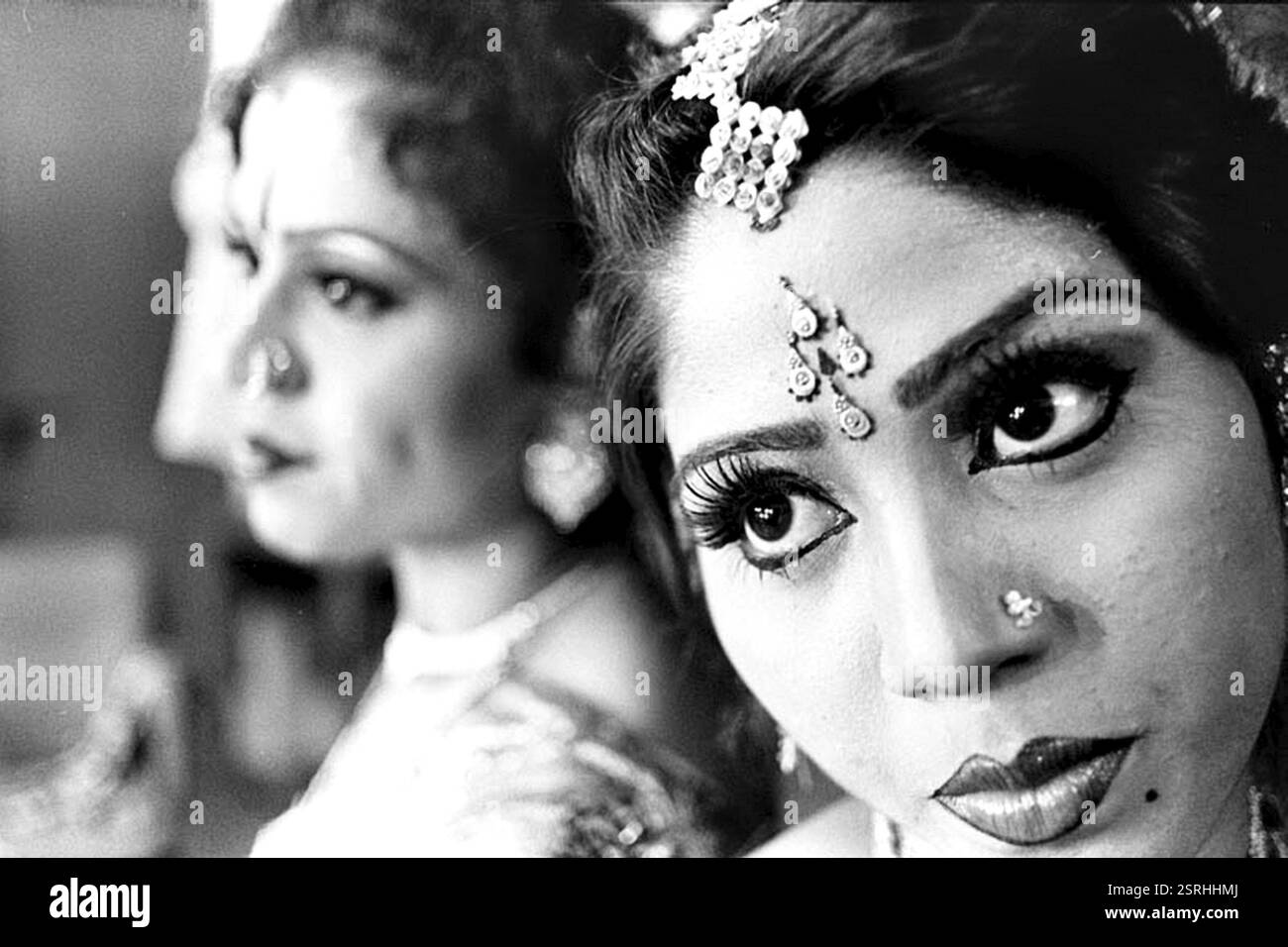 Two dancers look Black and White Stock Photos & Images - Alamy