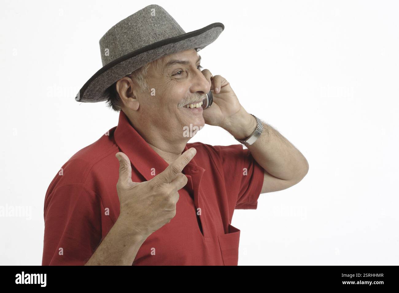 Old man speaking on cordless phone MR # 703B Stock Photo - Alamy