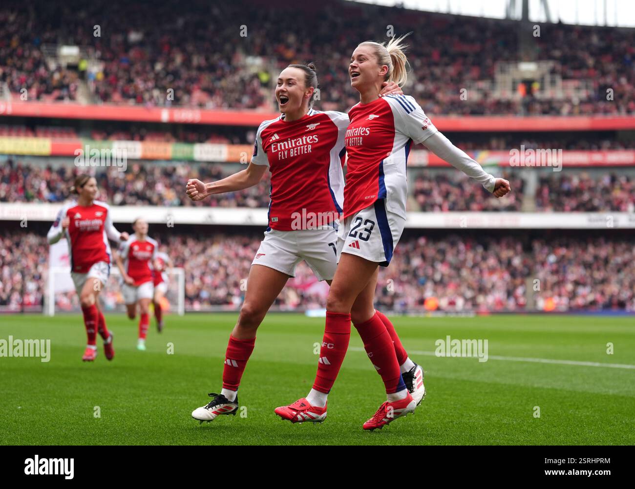 Arsenal's Caitlin Foord and Alessia Russo celebrate their side's first ...